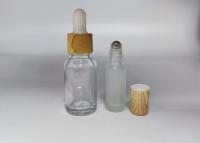 China 10ml Frosted Matte Roll On Glass Bottle with Bamboo Cap for Essential Oils for sale