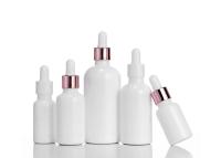 China 10ml 50ml 100ml White Glass Cosmetic Bottles Skin Care Packaging with Dropper for sale