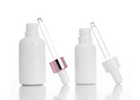 China 10ml 50ml 100ml White Glass Cosmetic Bottles Skin Care Packaging with Dropper for sale