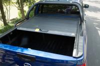 China Aluminum Folding Pickup Bed Cover for Toyota Tacoma 63kg Capacity Black Powder Coated for sale