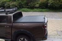 China Roll Up Hard Tonneau Cover for Ford Ranger T7 Aluminum Folding Truck Bed Cover 63kg for sale