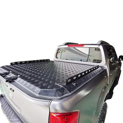 China Retractable Aluminum Alloy Hard Tonneau Cover for Toyota Hilux Revo 2020 Pickup Truck Bed Cover 63kg for sale