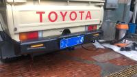 China Toyota LC79 Rear Bumper with Tire Carrier Jerrycan Holder 3-5mm Cold Rolled Steel for sale