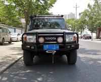 China Toyota LC79 Winch Bull Bar Front Bumper with Tire Carrier Jerry Can Holder 3-5mm Steel for sale