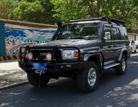 China Toyota LC79 Winch Bull Bar Front Bumper with Tire Carrier Jerry Can Holder 3-5mm Steel for sale