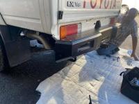 China Powder Coated Toyota LC79 Rear Bumper with Winch Front Bumper and Tire Carrier 3-5mm Steel for sale