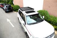 China Toyota Land Cruiser 200 Roof Rack 1500x1200mm Black Aluminum Alloy Luggage Carrier for sale