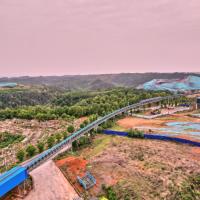 China Φ325mm Pipe Belt Conveyor | 350 t/h Bulk Material Handling System for sale