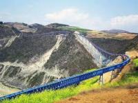 China Curved Overland Belt Conveyor for Efficient Long-Range Bulk Handling for sale