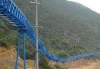 China Heavy-Duty Long-Distance Conveyor with Curved Routing for Mining and Cement Plants for sale