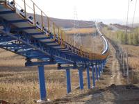China High-Capacity Overland Conveyor System for Long-Distance Curved Material Transport for sale