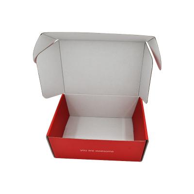 China Sturdy Kraft Small Red Folding Corrugated Mailer Boxes For Clothes for sale