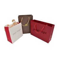China Eco Friendly Custom Paper Shopping Bags 210gsm Craft Gold Foil With Cotton Rope Handle for sale