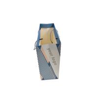 China Craft Paper Small Blue Custom Paper Shopping Bags With Ribbon for sale
