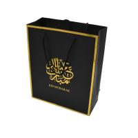 China Durable Black Custom Paper Shopping Bags With Golf Foil Logo for sale
