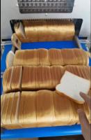 China Commercial Bread Slicing Machine 1.2kW 1200 Pcs/Hour 304 Stainless Steel Automatic Toast Cutter for sale