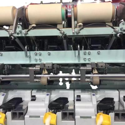 China Digital High Speed Rotor Spinning Machine 60000-120000 rpm for Cotton Polyester Yarn Count Ne 3-40 for sale