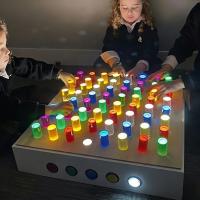 China Sensory LED Activity Light Panel with Colourful Pegs – Interactive DIY Play Wall for Children for sale
