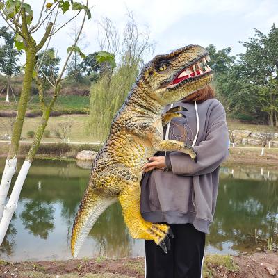 China Realistic Hand Dinosaur Puppet Sunproof Tyrannosaurus Rex Hand Puppet for Performance for sale