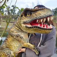 China Realistic Hand Dinosaur Puppet Sunproof Tyrannosaurus Rex Hand Puppet for Performance for sale