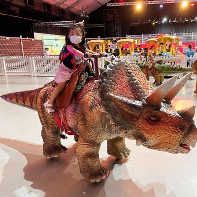 China Electric Walking Dinosaur Ride Animatronic Triceratops Dinosaurs Ride for Children for sale
