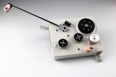 China QH-MTAM Magnetic Tensioner for Coil Winding - 0.35-0.8mm Copper Wire with 300-1500g Tension Range for sale