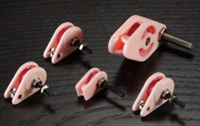 China Pink Caged Ceramic Pulley with Ra0.2 Polish and 3.85g/cm³ Density for Precision Coil Winding Tension Control for sale