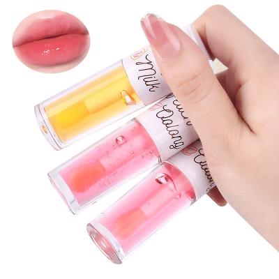 China Moisturizing Lip Oil Peach Flavor Honey Plumper Lips Clear Gloss Oil for sale
