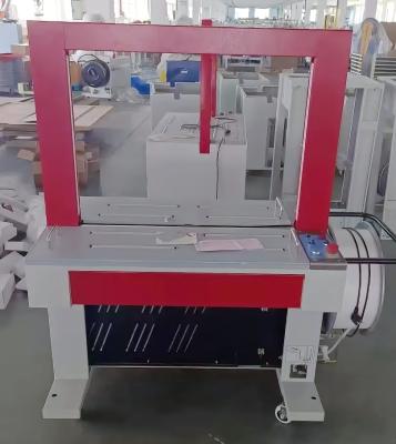 China Fully Automatic PP Strapping Carton Heat Sealing Machine; Semi-automatic Dual-motor Strapping Machine. for sale