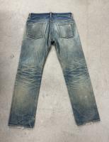 China Light Wash Jeans With Heavy Fading And Whiskering For A Rugged Vintage Look for sale