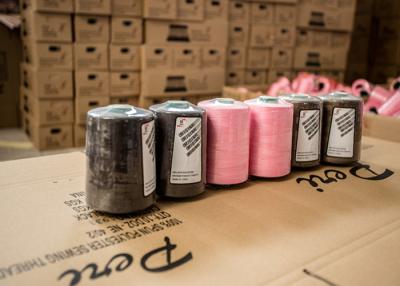 China 40S/2 5000 yards Silicone Coated Spun Polyester Thread Industrial Sewing Thread for sale
