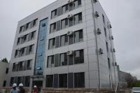 China Rigid Frames Multi Storey Steel Frame Construction Q235 Pre Engineered Steel Building for sale