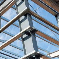 China Customized Logo Q235 Industrial Steel Structure Building Steel Frame Car Park Antirusty for sale