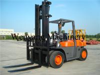 China Pneumatic 7T Diesel Powered Forklift 4x4 Forklift 1220*150*65mm Fork Dimension for sale