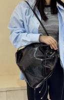 China Top-grain oil-waxed cowhide genuine leather Large-capacity drawstring shoulder bag backpack Duffel Bag Fashion Bags for Women Wholesale backpack Supplier for sale
