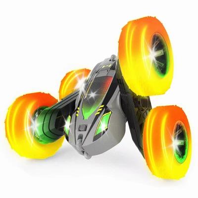 China 2.4GHz Remote Control Stunt Car with 50m Range and 18min Runtime - Double-Sided Design with LED Wheels for sale