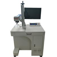China 20w 30w 50w Steel Metal Plastic Raycus Fiber Laser Marking Machine With Rotary 0.01mm for sale