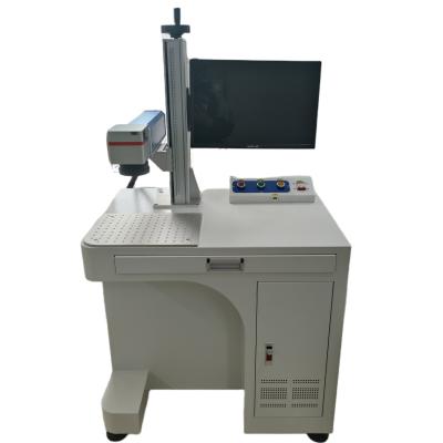 China 20w 30w 50w Steel Metal Plastic Raycus Fiber Laser Marking Machine With Rotary 0.01mm for sale
