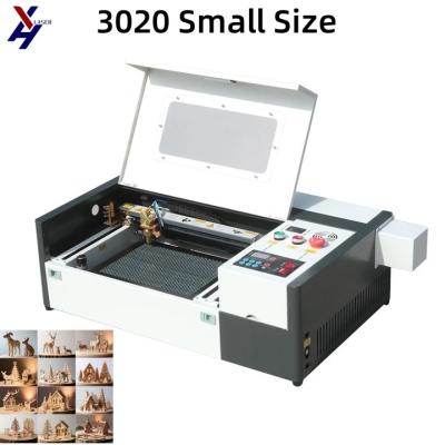 China 3020 Mini CO2 Laser Cutting Machine Laser Cutter 40W 50W Engraving Machine for sale