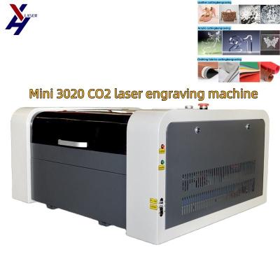 China M2 Ruida Awc Topwisdom System 4040/3050/3020/4060 CO2 Laser Engraver And Cutter For MDF Paper for sale