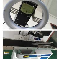 China 20W 30W 50W 100W Automatic Cabinet Fiber Laser Marking Engraving Machine With Conveyor Belt for sale