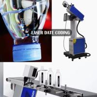 China Manufacturer Flying CO2 Laser Marking Machine For Production Line Date Printer Pet Bottle Date Marking Machine for sale