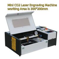 China 40W 50W 300*200 3020 Small Portable Laser Engraver CO2 Laser Printer for sale