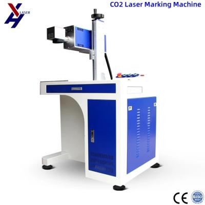 China CO2 Laser Marker Digital 30W 40W Laser Marking Machine For Wood Bamboo Rubber for sale