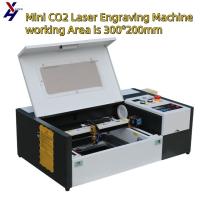 China 3020 Small Laser Engraver 40W 50W Laser Rubber Stamp Machine Laser Carving Machine for sale