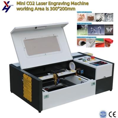 China 3020 40W 50W CO2 Laser Cutting Machine For Wood Paper Leather Acrylic Engraving Thickness 1----5mm for sale