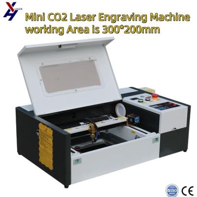 China Small Size Mini CO2 Laser Engraver For Wood Acrylic Glass for sale
