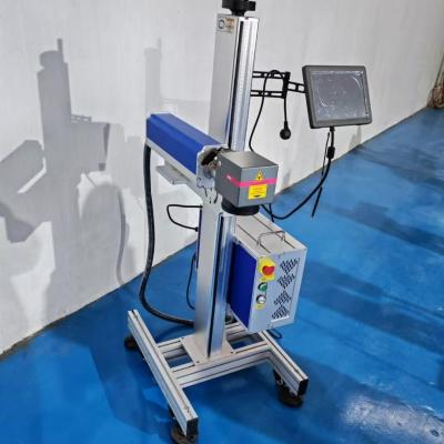 China Precision Laser Coding On Fly Boost Speed Efficiency Flying Marking Machine for sale