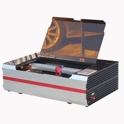 China 3020 50W CO2 Laser Engraving Machine 300x200mm with Ruida Control for sale