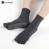 China Custom Soft Cotton Non Slip Yoga Socks For Women Five Toe Grip Yoga Socks for sale